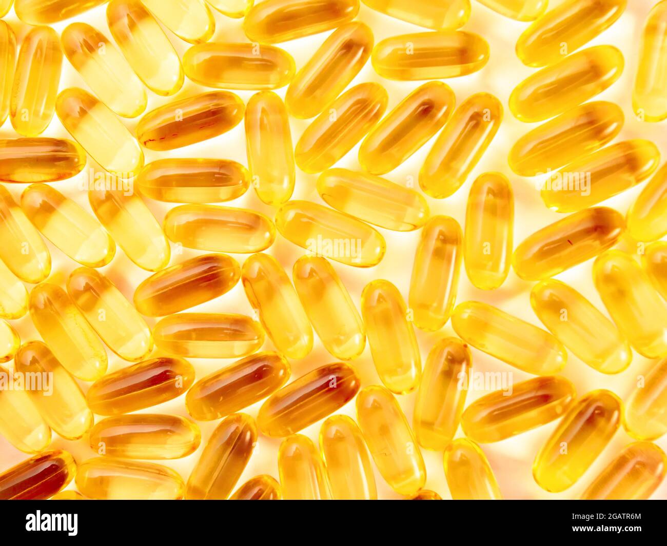 fish oil omega 3 on white background texture Stock Photo - Alamy