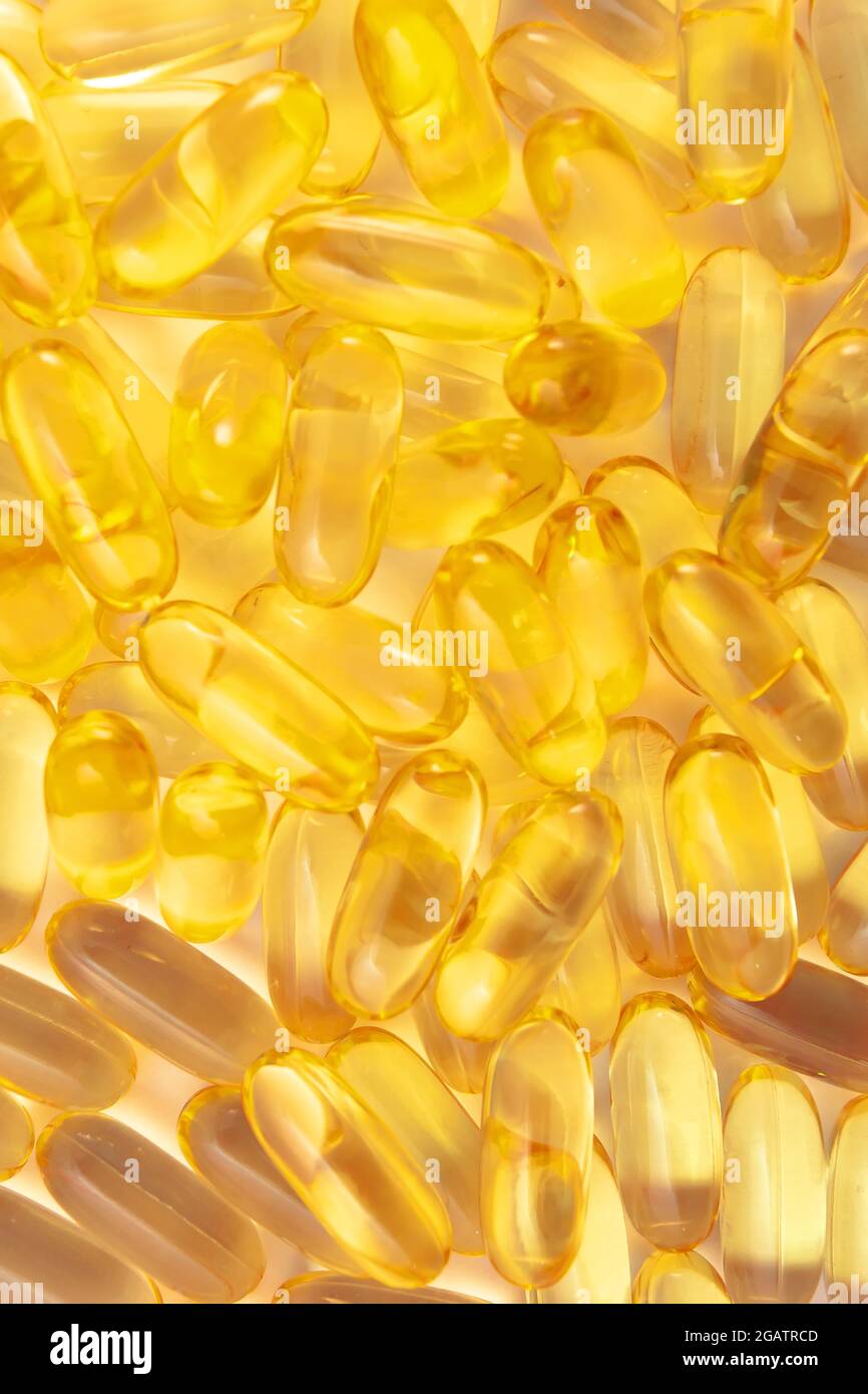 fish oil omega 3 on white background texture Stock Photo - Alamy