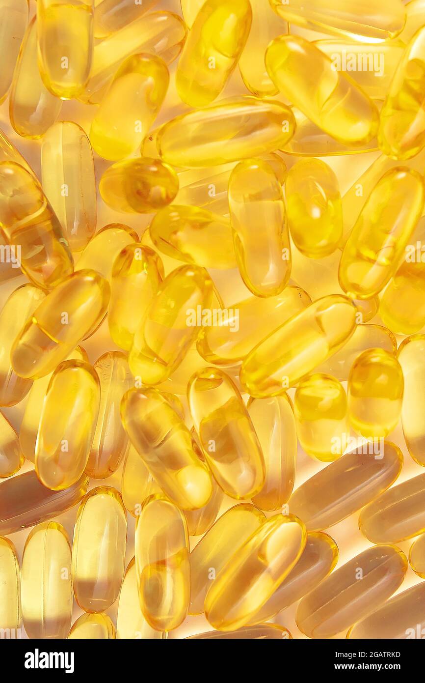 fish oil omega 3 on white background texture Stock Photo - Alamy