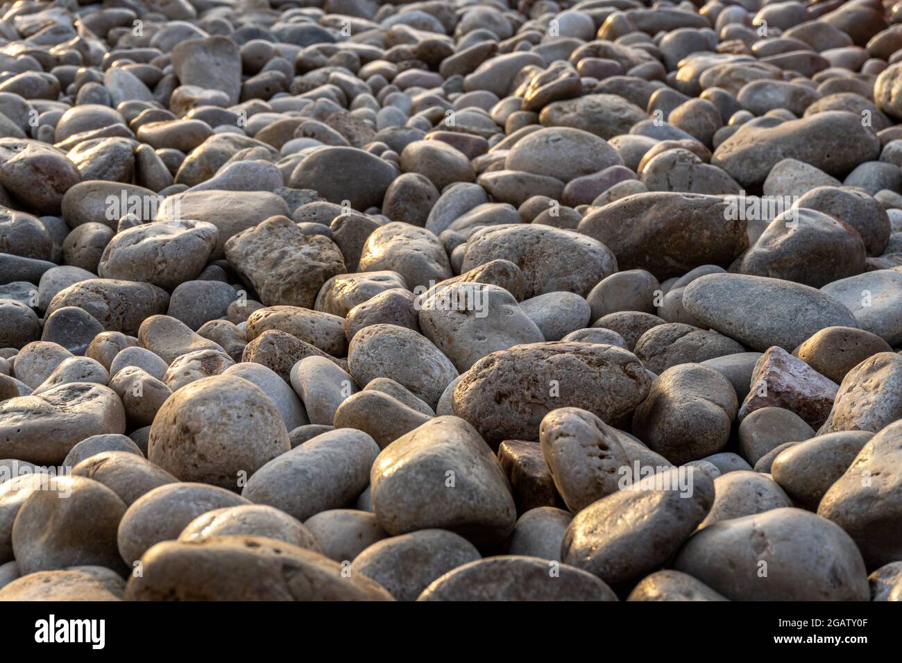 A beautiful pebble beach texture background Stock Photo - Alamy
