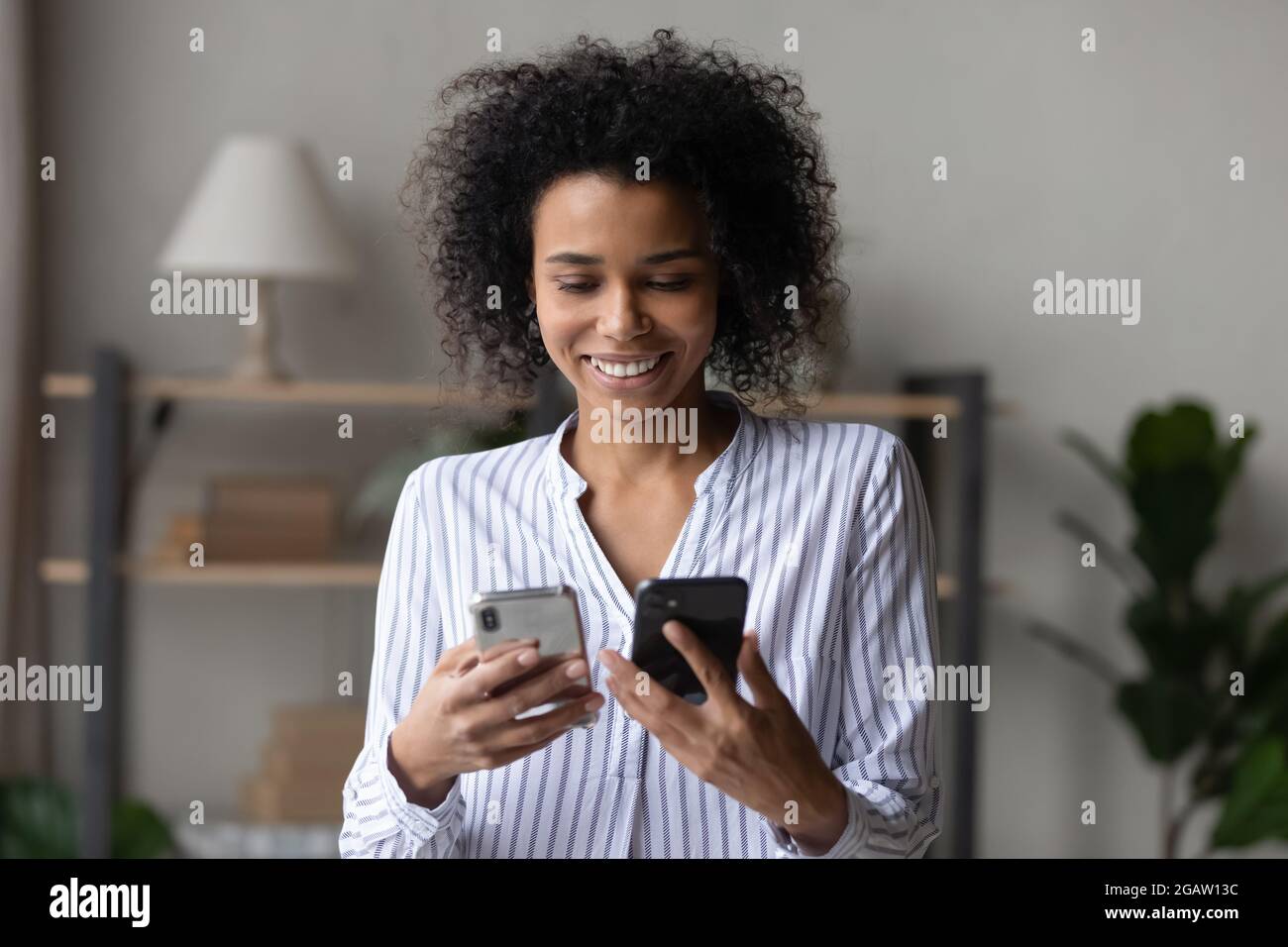 Woman video call two smartphones hi-res stock photography and images ...