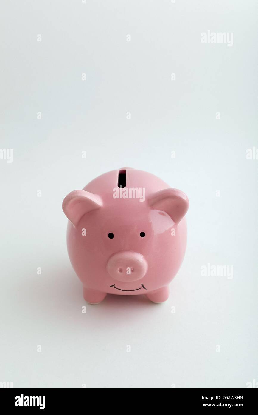Piggy bank in the shape of a pig on an isolated white background Stock ...