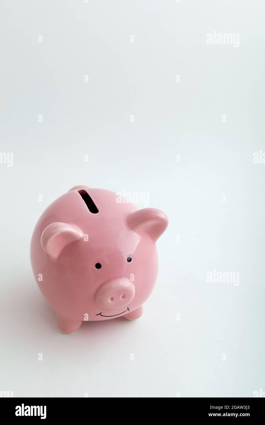 Piggy bank in the shape of a pig on an isolated white background Stock ...