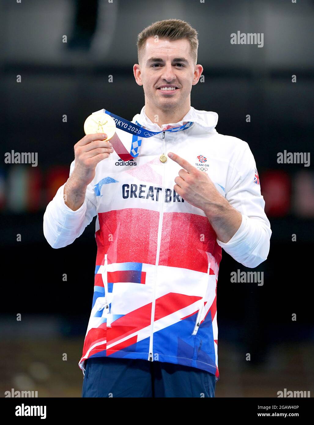 Great Britain's Max Whitlock celebrates with his gold medal after ...