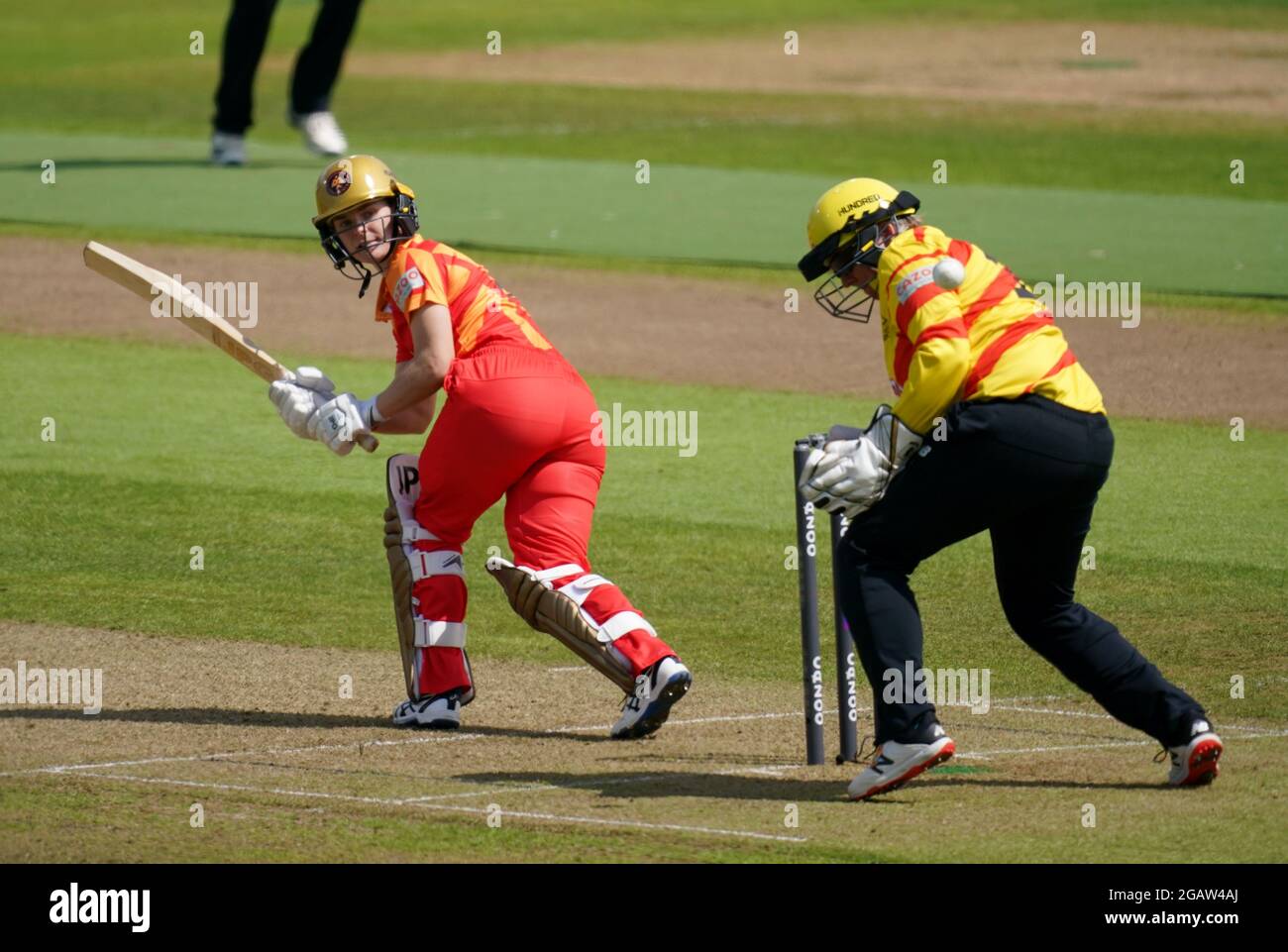 Birmingham Phoenix's Katie Mack (left) batting as Trent Rockets' wicket ...