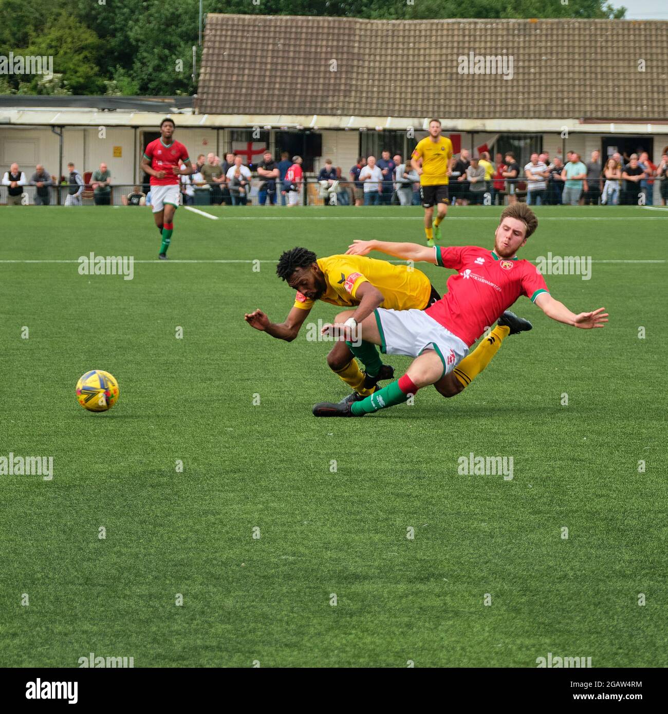 Footballers midfield tackle hi-res stock photography and images - Alamy