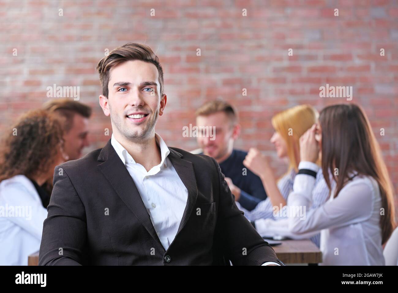 Young business man at the meeting in a conference room Stock Photo - Alamy