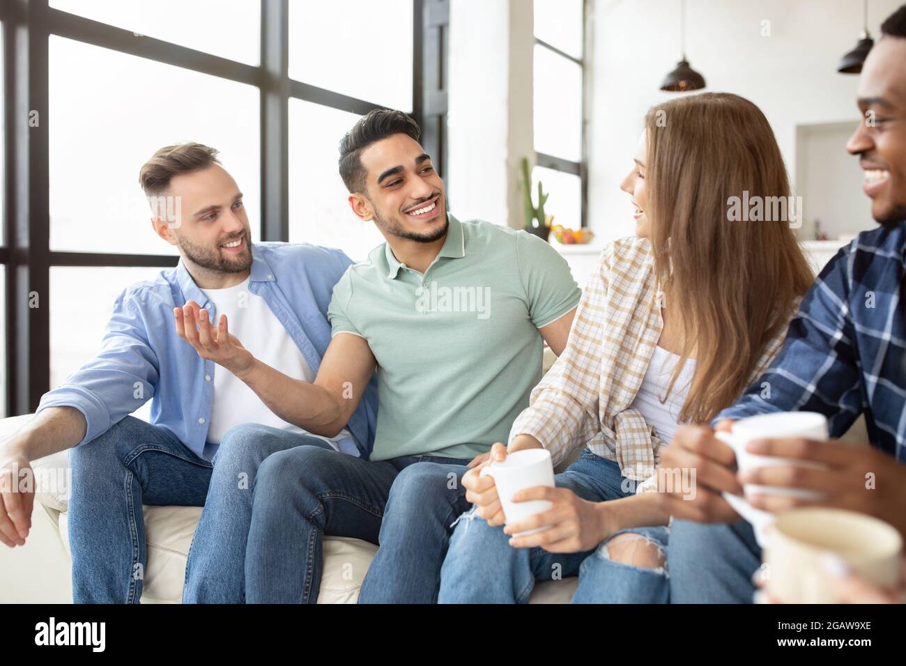 Female friends chatting together hot hi-res stock photography and ...