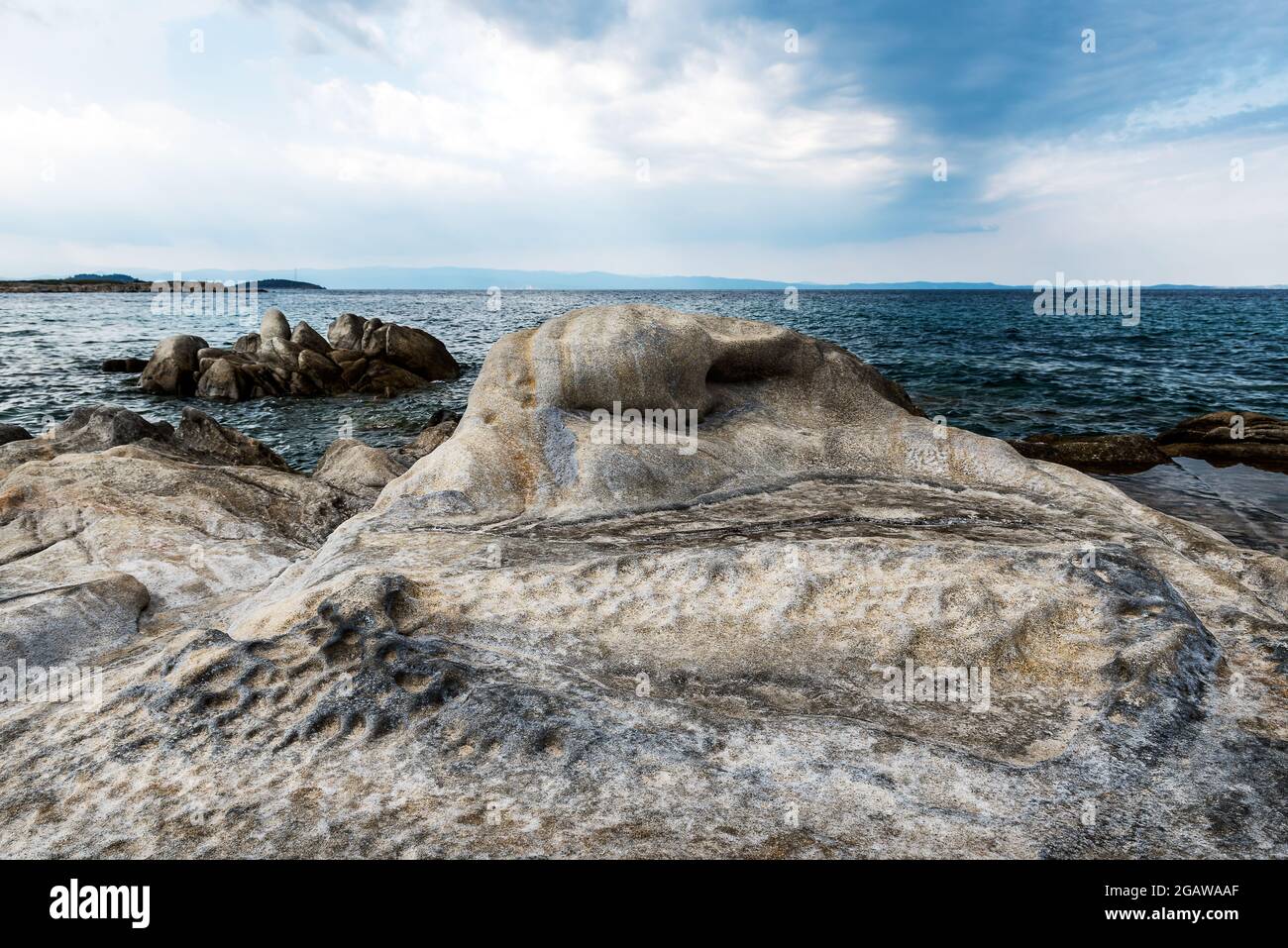 Seascape of rocky beach with beautiful rocks formations. Sea waves ...