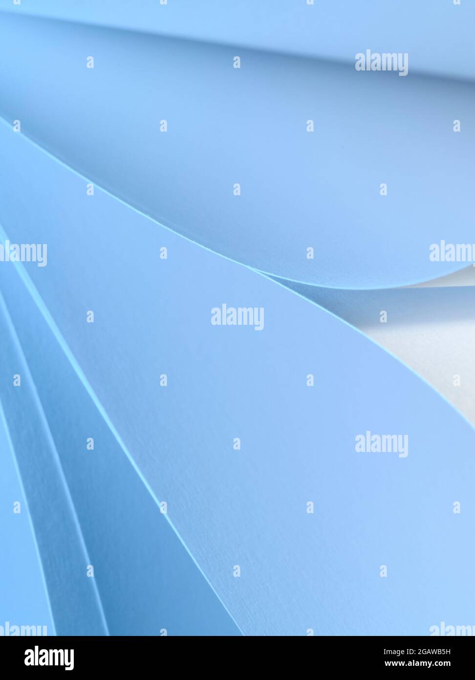 Sheets of paper illuminated by two flashguns with coloured gels in the ...