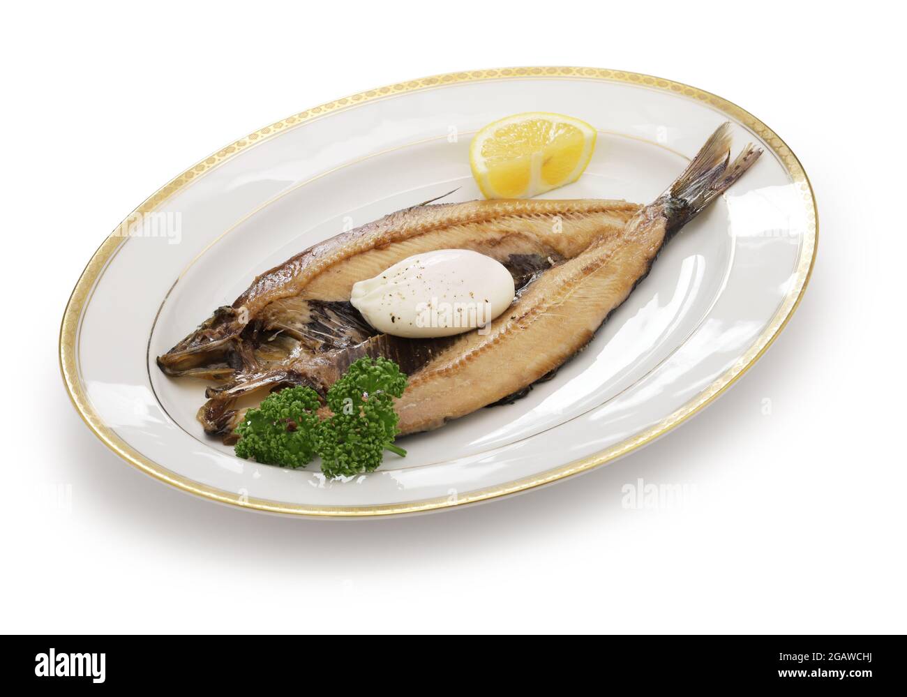 kipper(smoked herring) and poached egg, traditional British breakfast ...