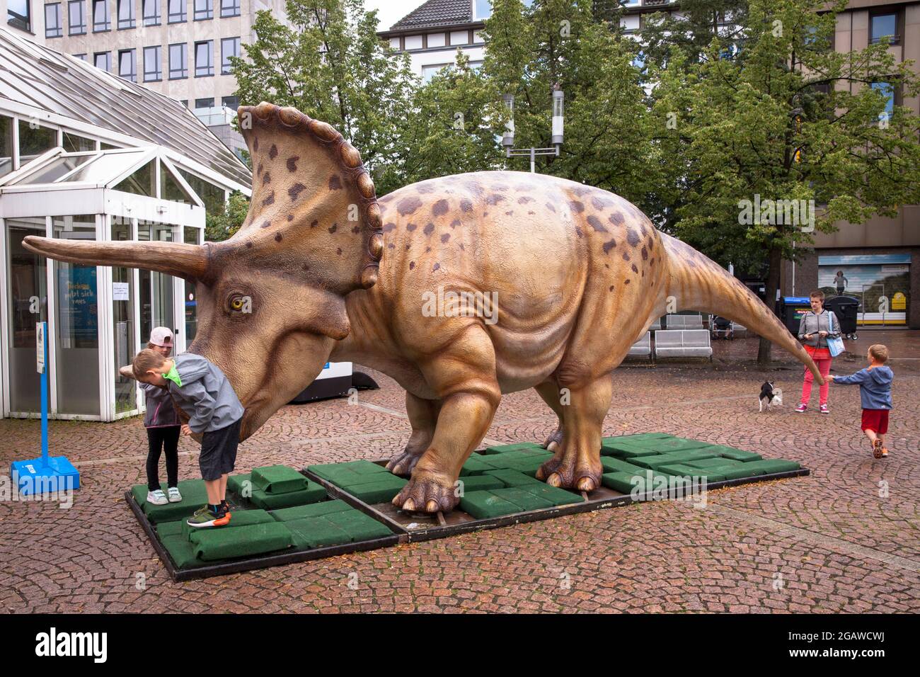life-size dinosaurs models exhibited at various locations in the city ...