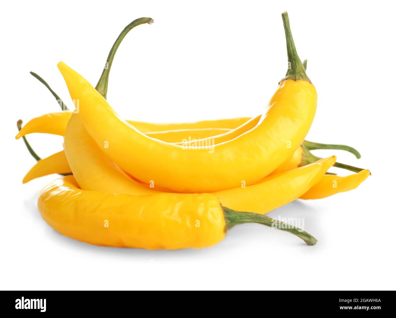 Yellow chili peppers isolated on white Stock Photo - Alamy