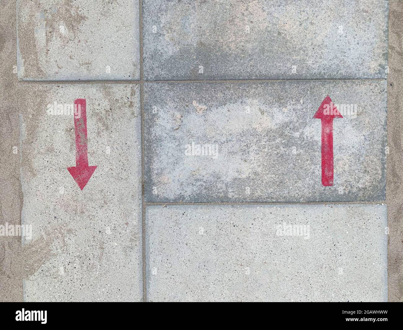 Arrows on walkway beach - Arrows on walkway indicate the way Stock ...