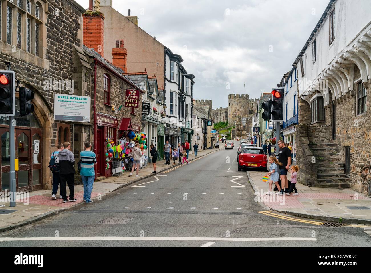 CONWY, WALES - JULY 04, 2021: Street view of Conwy and it's famous 13th ...
