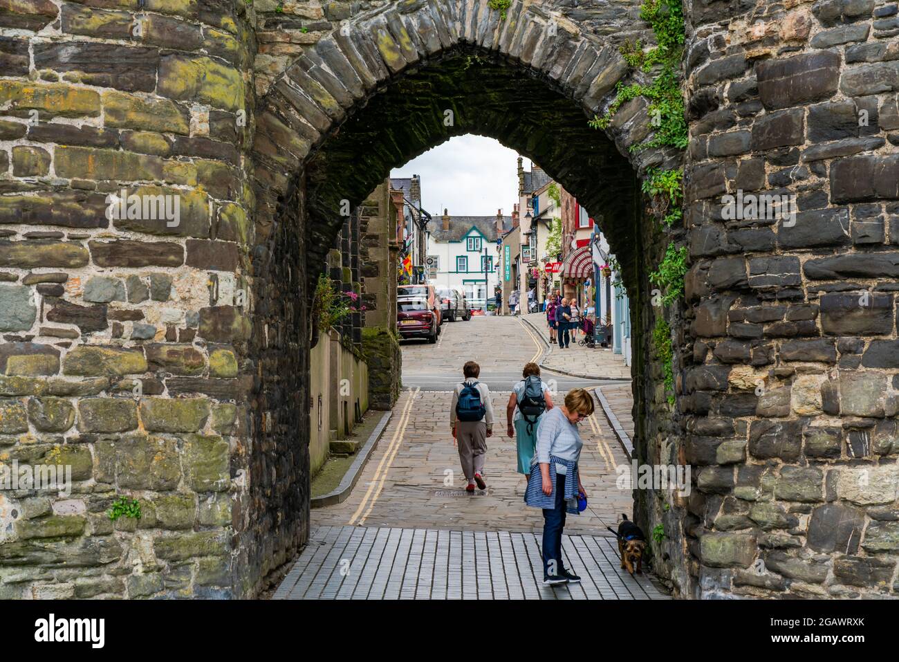 CONWY, WALES - JULY 04, 2021: Street view of Conwy, a costal market ...
