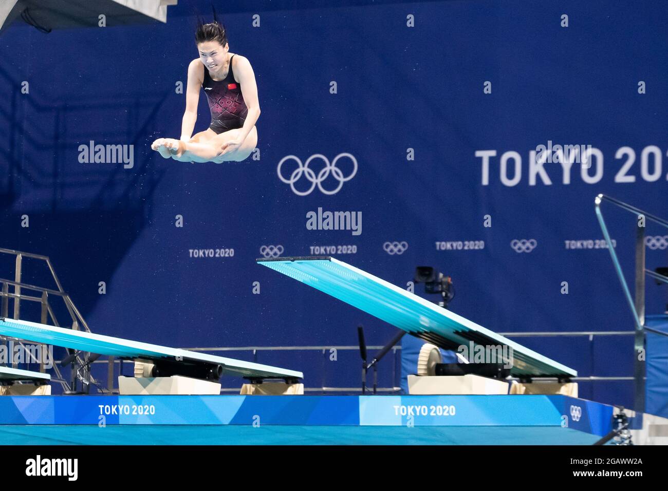 July 31, 2021: Han Wang of China tucks for the dive during the Women's ...