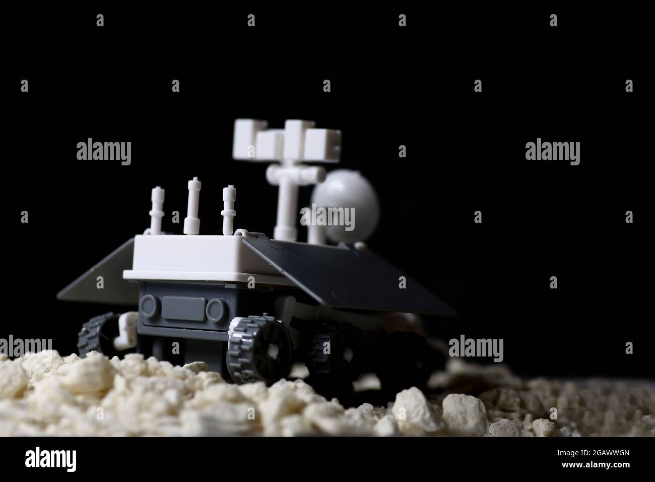 space program - lunar rover walking on lunar surface Stock Photo - Alamy