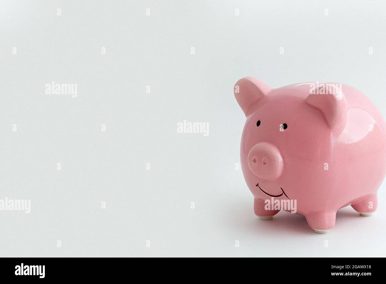 panorama Piggy bank in the shape of a pig on an isolated white ...