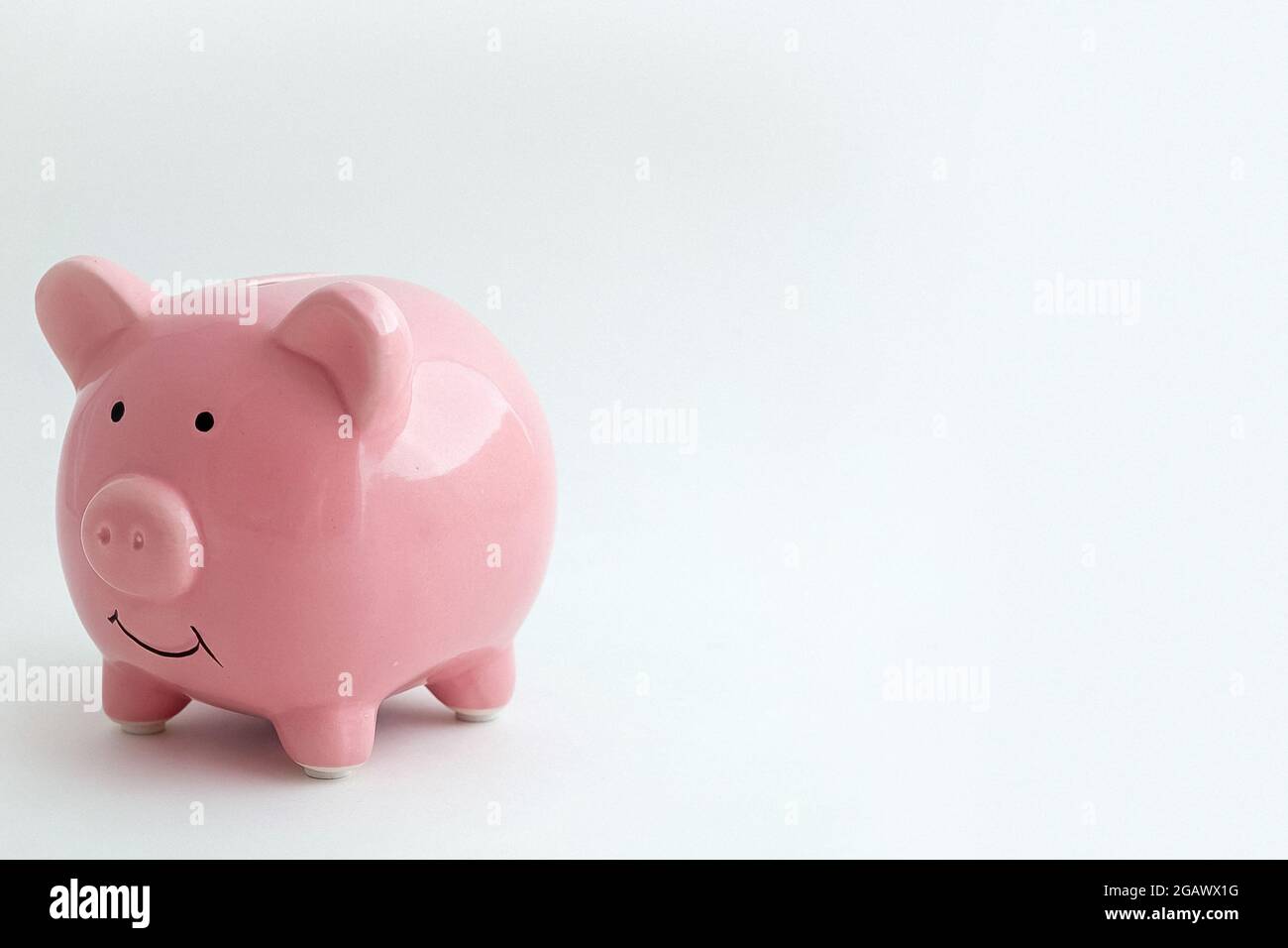 panorama Piggy bank in the shape of a pig on an isolated white ...