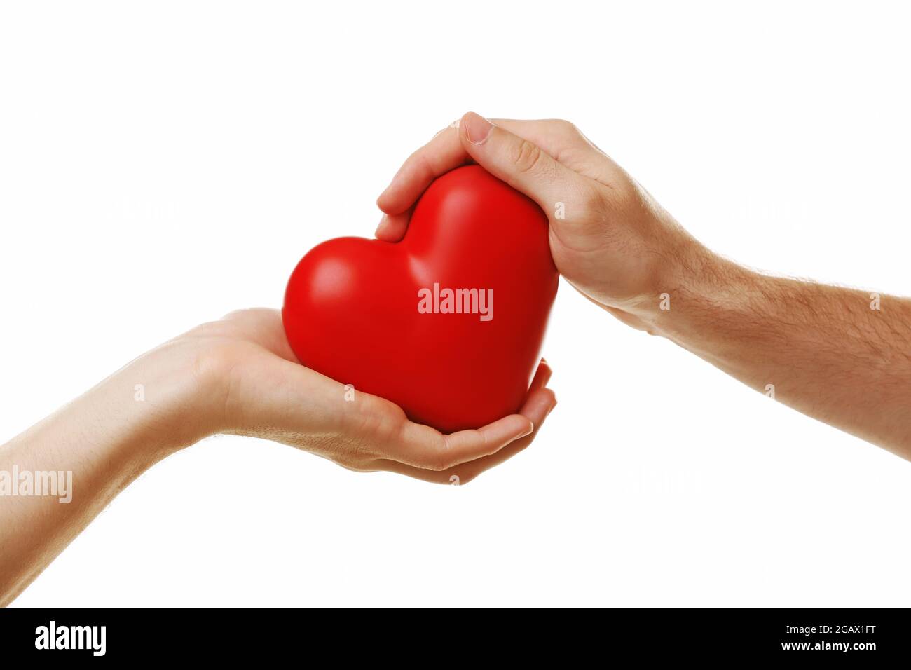 Heart joining two hands hi-res stock photography and images - Alamy