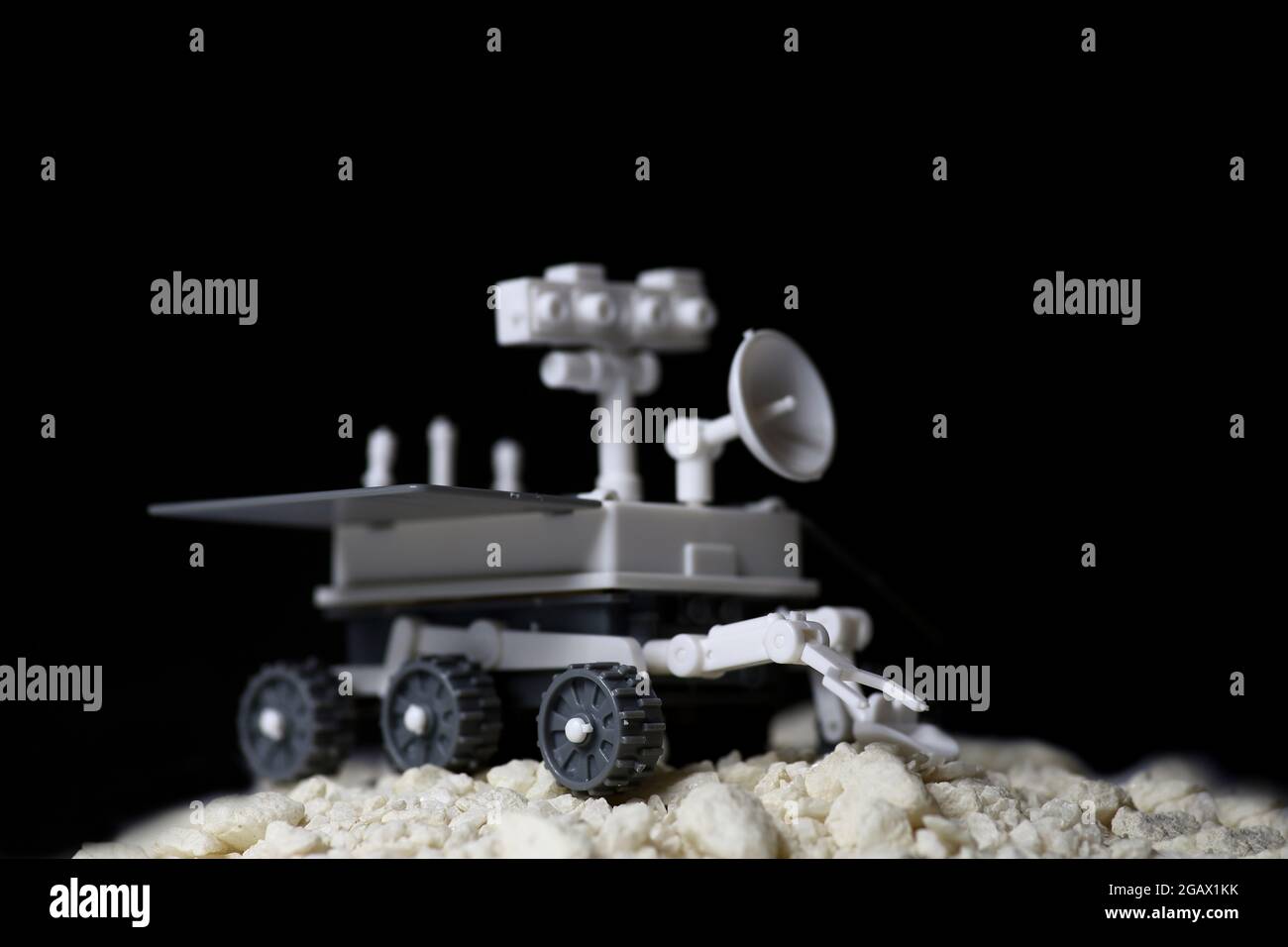 space program - lunar rover walking on lunar surface Stock Photo - Alamy