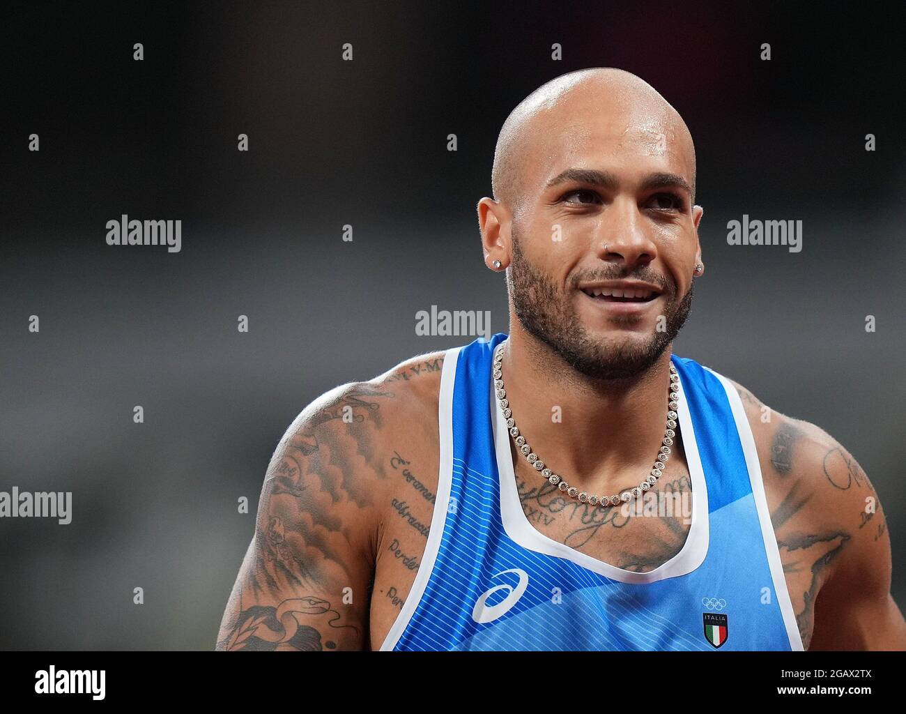 Tokyo, Japan. 1st Aug, 2021. Lamont Marcell Jacobs of Italy reacts ...