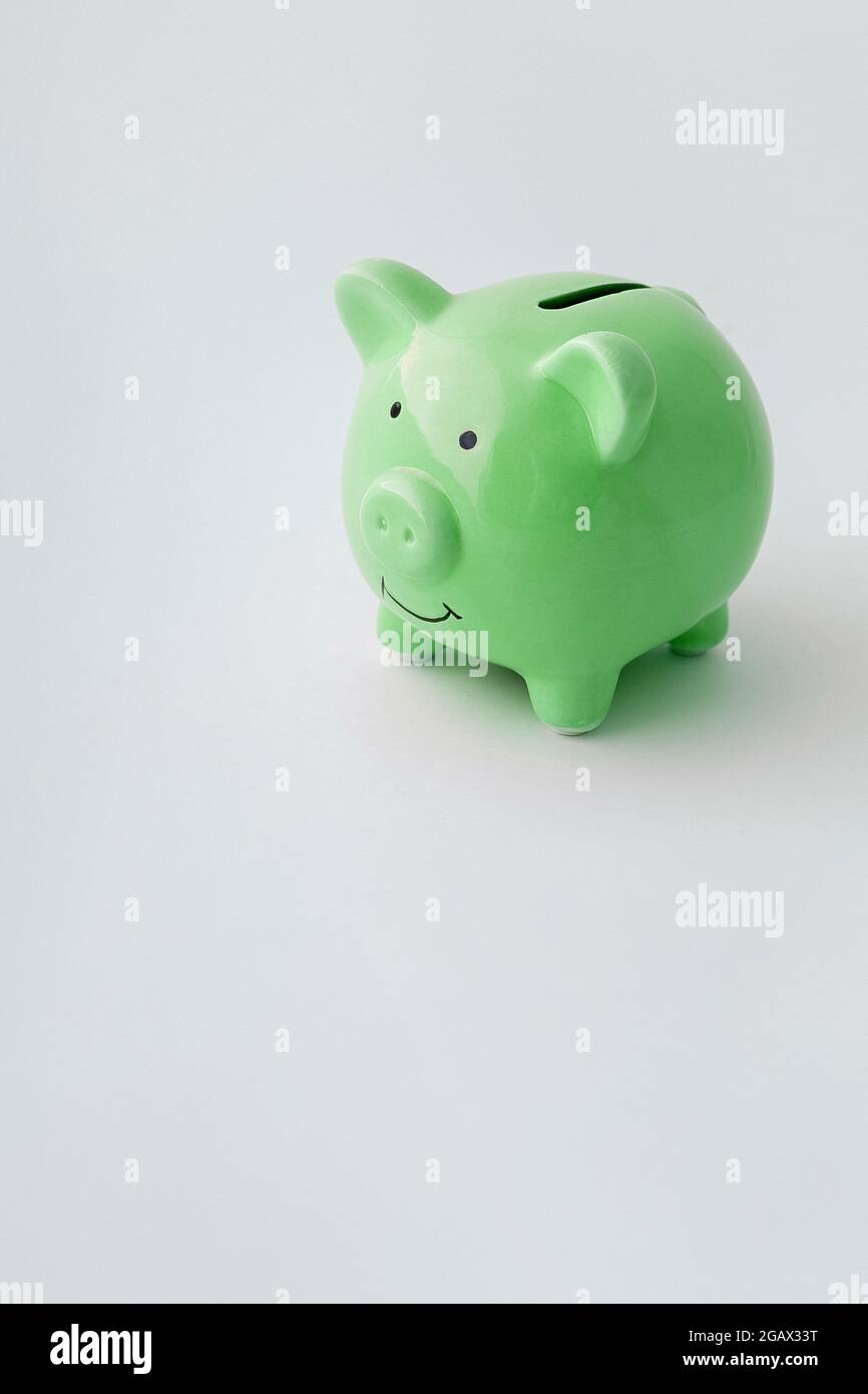 Piggy bank in the shape of a pig on an isolated white background Stock ...