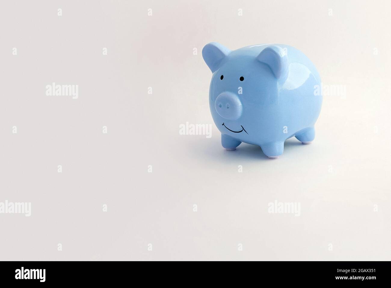 Piggy bank in the shape of a pig on an isolated white background Stock ...
