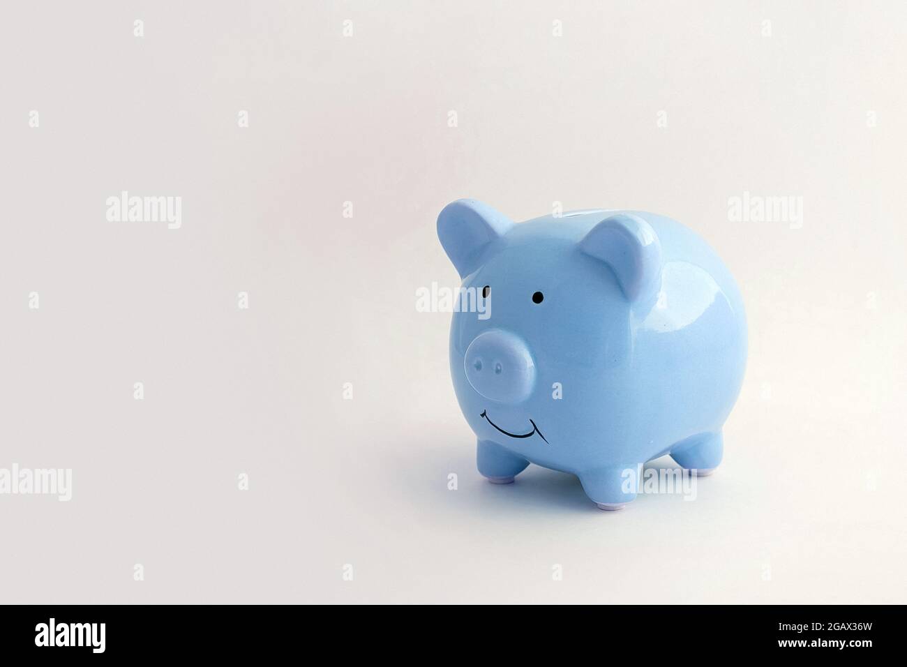 Piggy bank in the shape of a pig on an isolated white background Stock ...