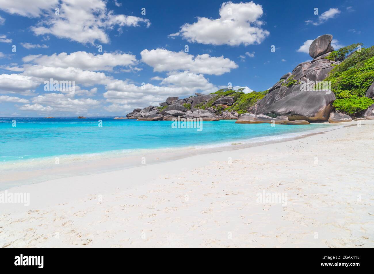 Beautiful sandy beach with wave crashing on sandy shore at Similan ...
