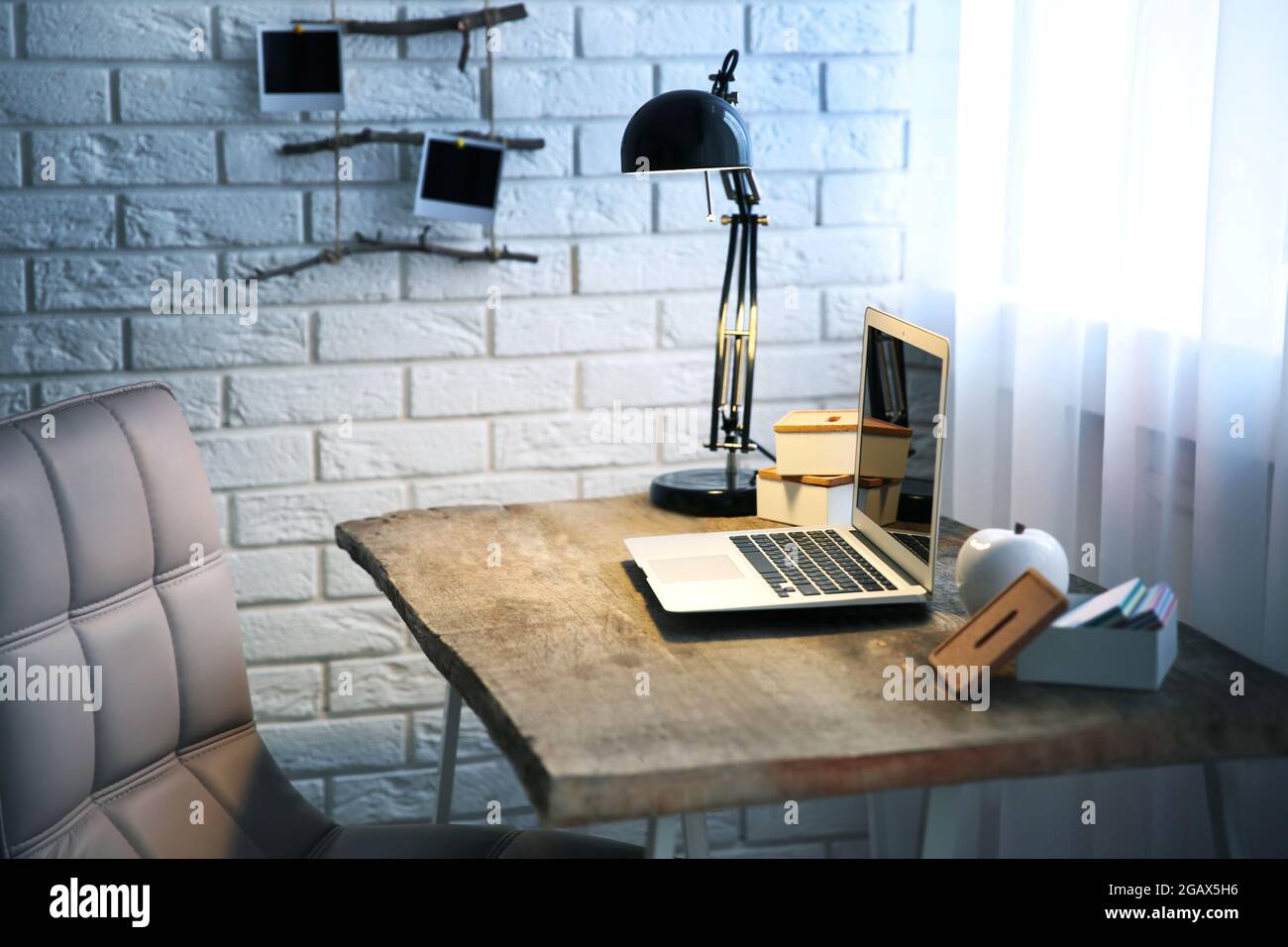 Modern workplace on light background Stock Photo - Alamy