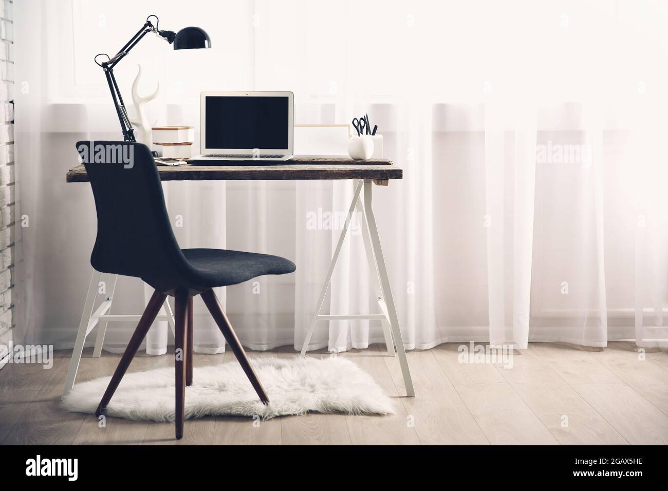 Modern workplace on light background Stock Photo - Alamy