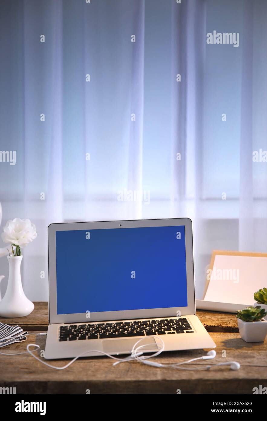 Modern workplace on light background Stock Photo - Alamy