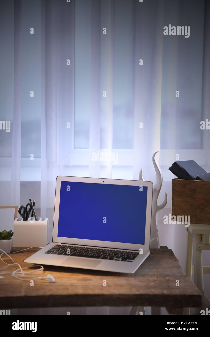 Modern workplace on light background Stock Photo - Alamy