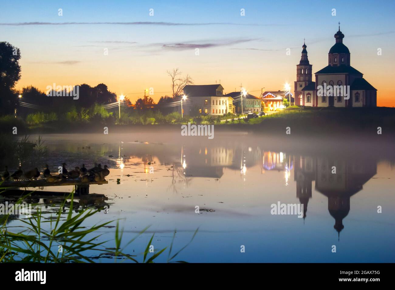 Travel city town sunset reflection hi-res stock photography and images ...