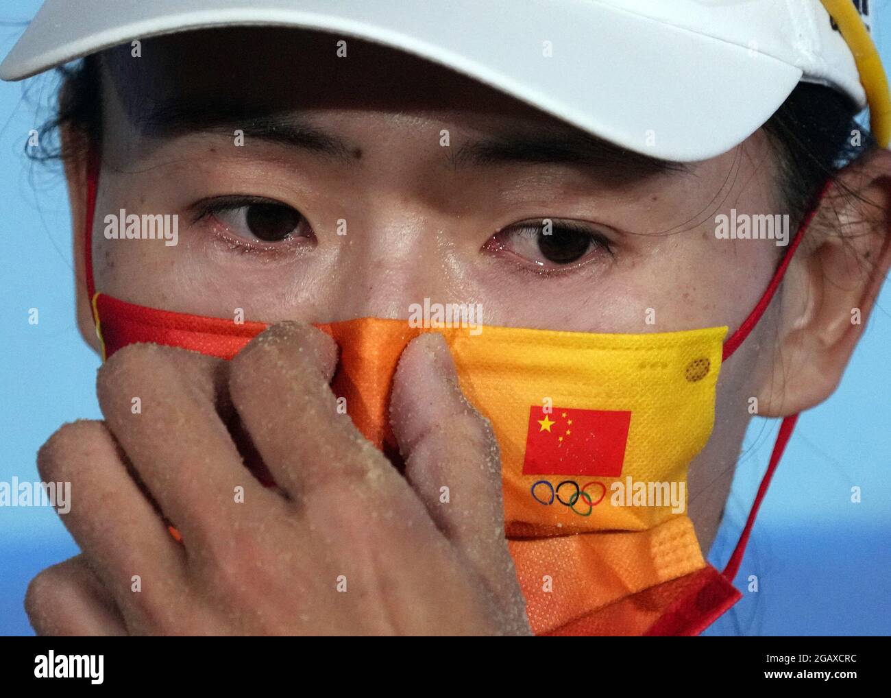 (210801) -- TOKYO, Aug. 1, 2021 (Xinhua) -- Xue Chen of China reacts ...