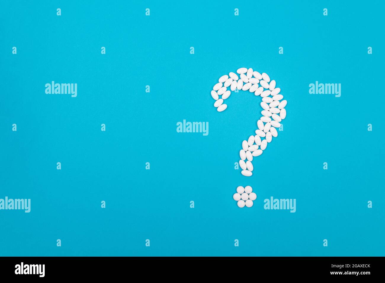 Question Mark Made from White Pills and Tablets, Lying on Blue ...