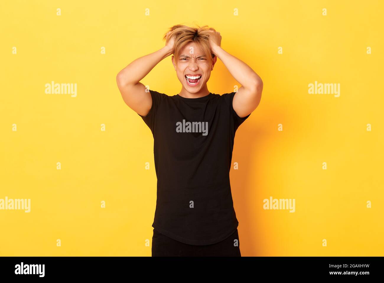 Portrait of pissed-off angry asian man tossing haircut and yelling ...