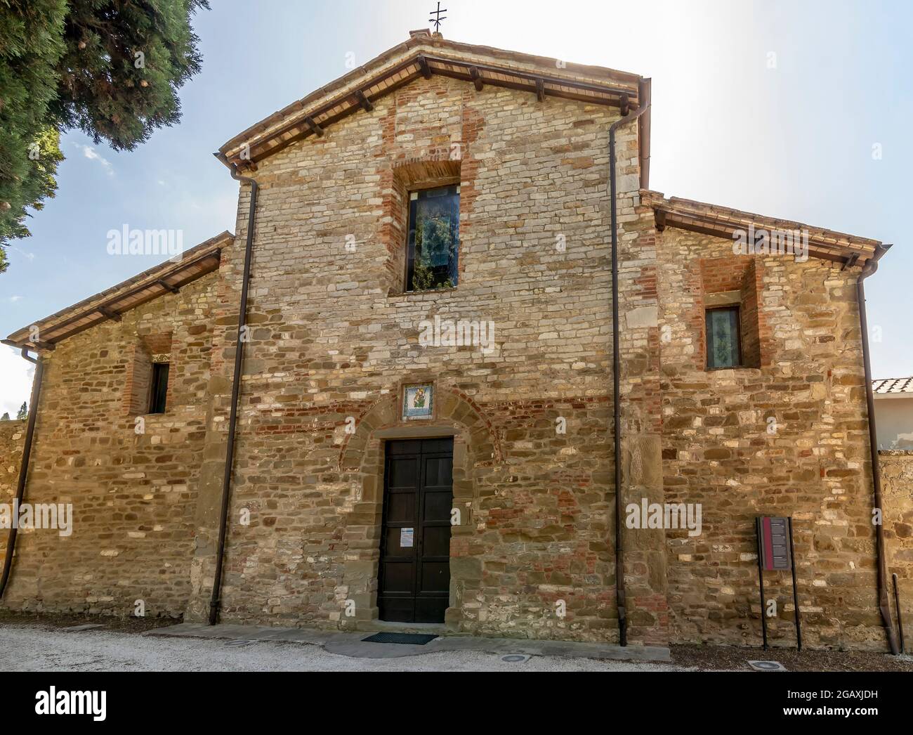 The facade of the ancient Pieve di San Cristoforo in the historic ...