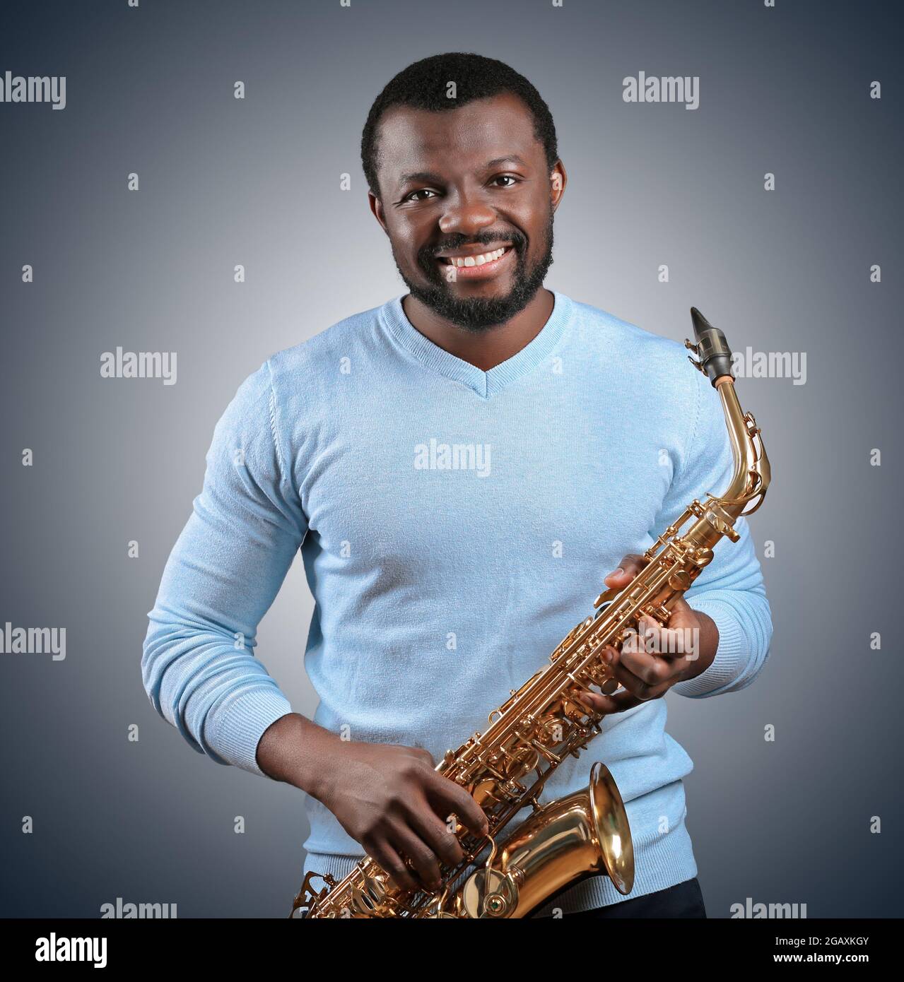 African American jazz musician playing the saxophone Stock Photo - Alamy