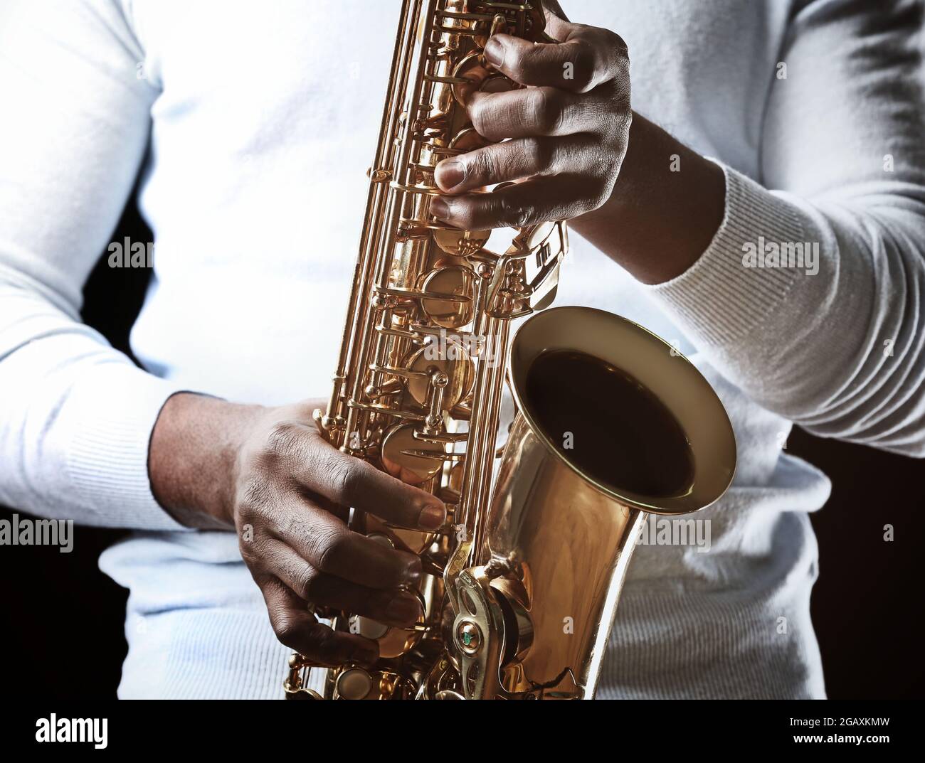 African American jazz musician playing the saxophone, closeup Stock ...