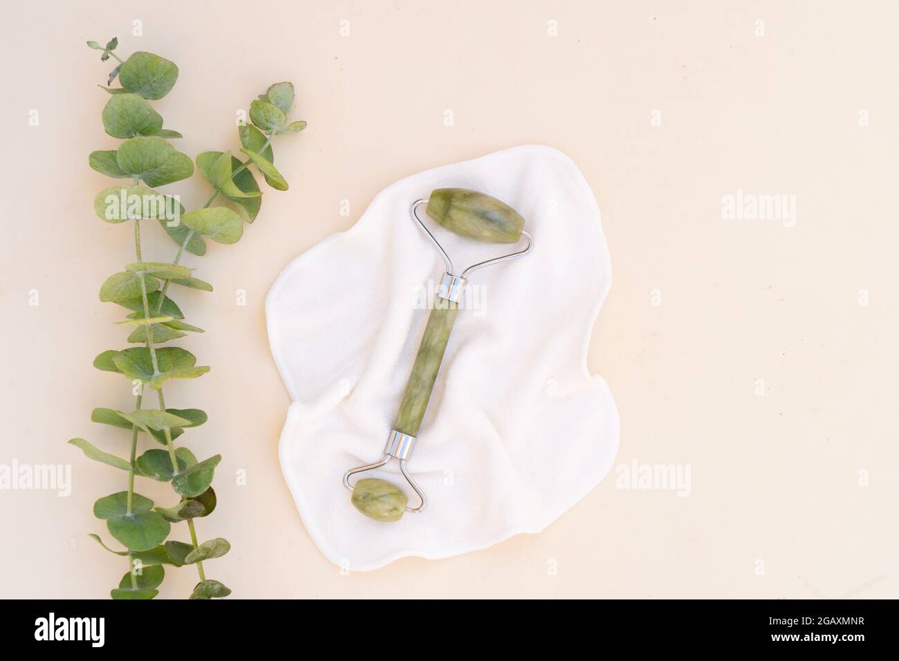 gua sha, face massage roller Stock Photo - Alamy