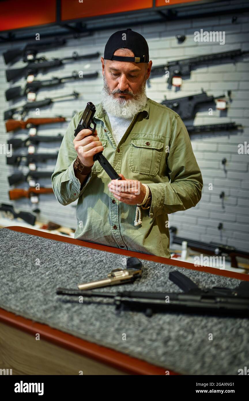 Reload man hi-res stock photography and images - Alamy