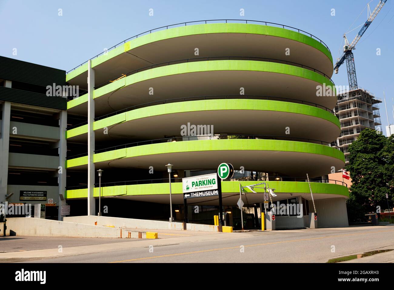 Exterior Parking Garage Ramp Car Driving Down A Spiral Ramp In A