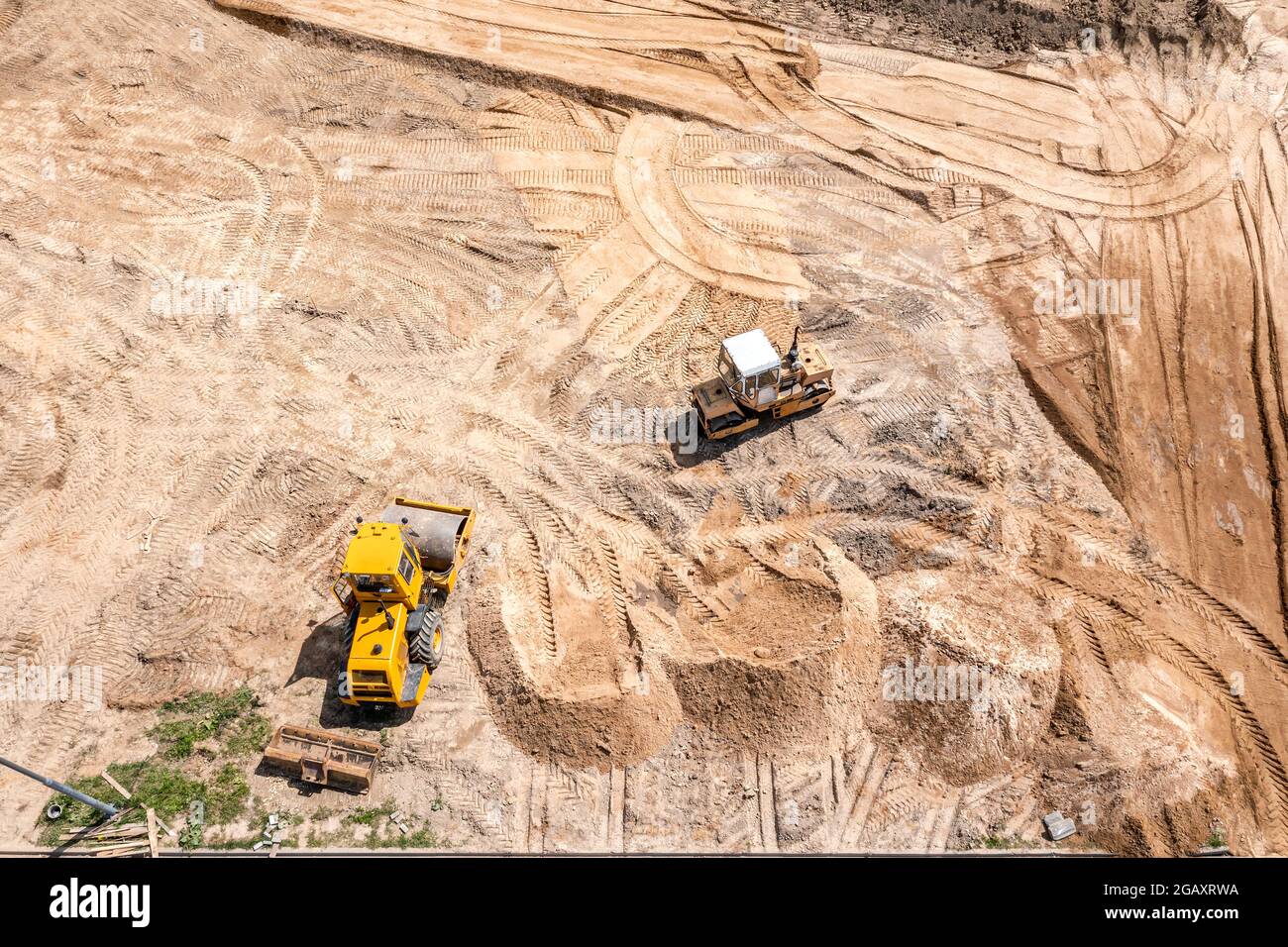 aerial top view of construction machines. industrial road rollers is ...
