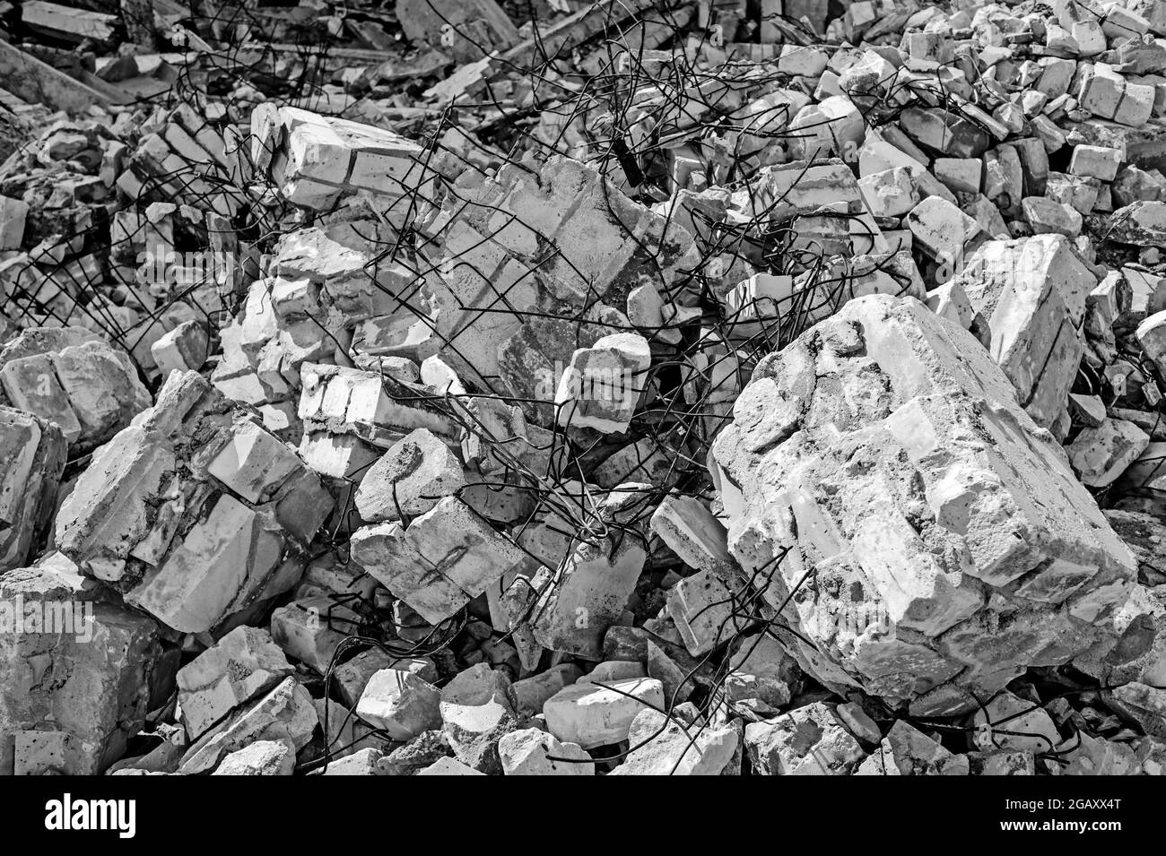 Texture in the form of scattered stones remains of a destroyed building ...