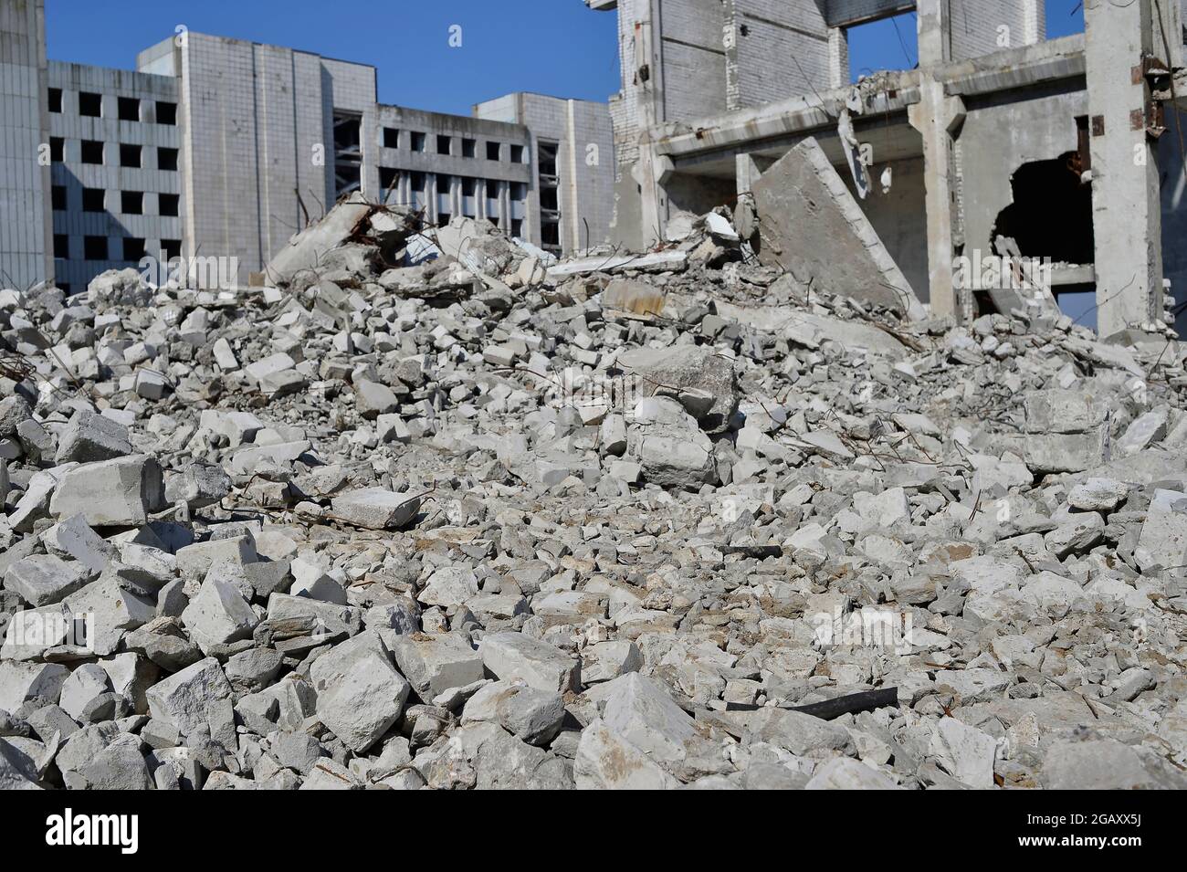 The remains of the destroyed building of a large industrial facility ...