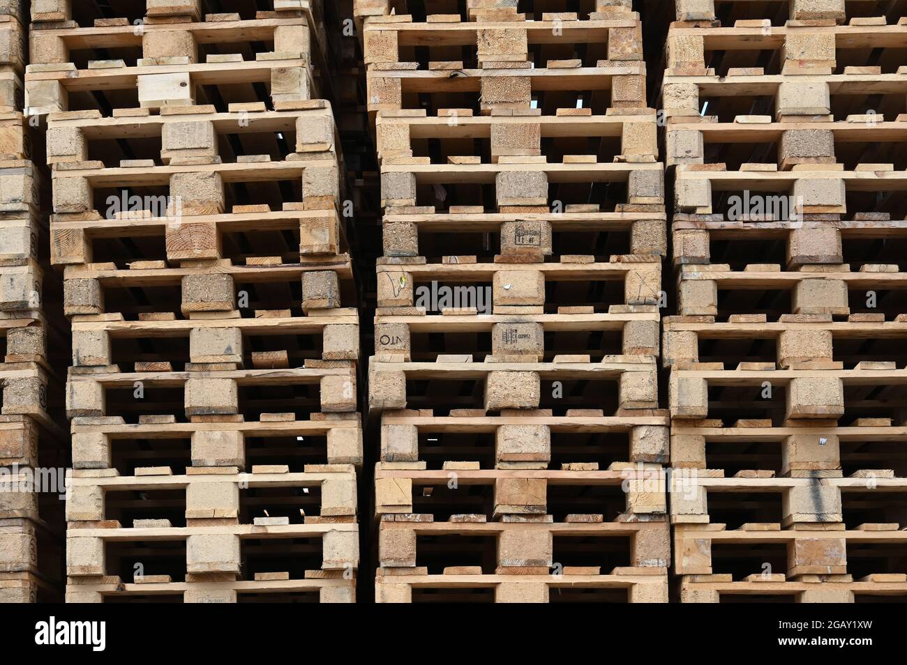 Stack with wooden pallets Stock Photo - Alamy