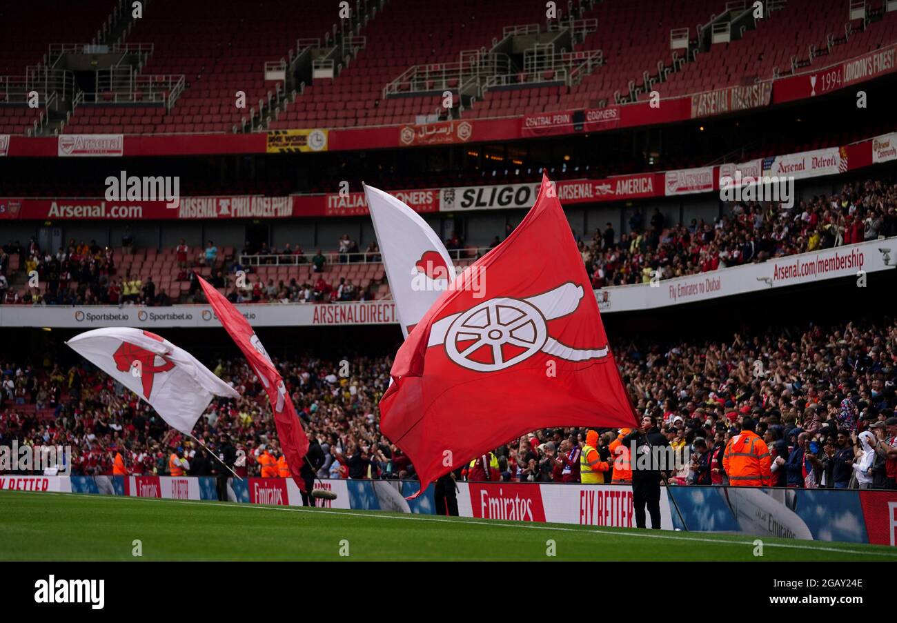 Giant Arsenal flags being waved before kick off during The Mind Series ...
